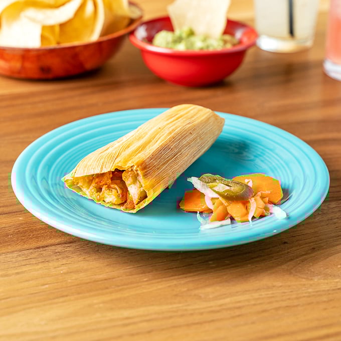 The humble tamale&mdash;corn husk gift wrap around a present of perfectly seasoned filling. Unwrap slowly and savor the revelation inside.
