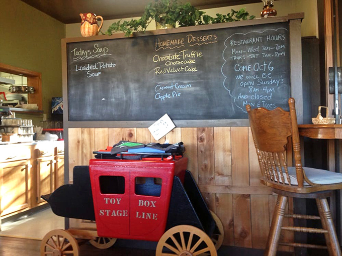 The chalkboard menu announces today's homemade desserts like breaking news&mdash;because in Dayville, a fresh coconut cream pie IS breaking news.