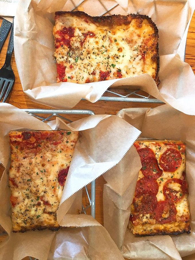 These pizza slices aren't just lunch&mdash;they're a masterclass in proper cheese-to-sauce ratio. That pepperoni one is practically winking at you.