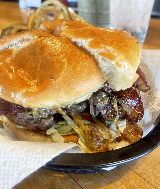 This isn't just a burger&mdash;it's structural engineering. The bacon adds both architectural support and a salty-smoky flavor boost.