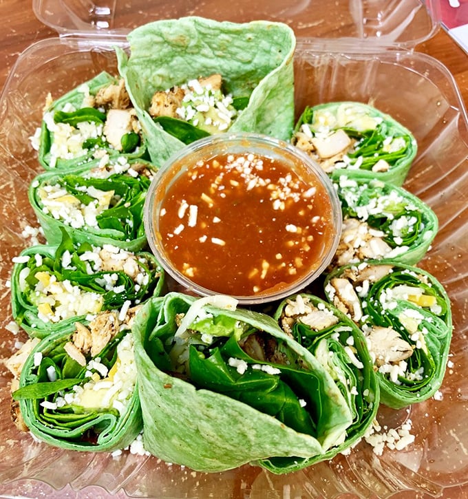 Green wraps arranged like a delicate flower&mdash;proof that healthy options don't have to look like punishment on a plate.