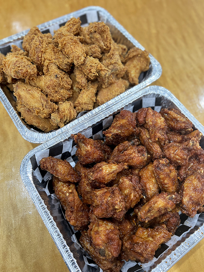 A study in contrasts: classic crispy meets glazed perfection in these aluminum trays of chicken nirvana &ndash; choose your fighter.