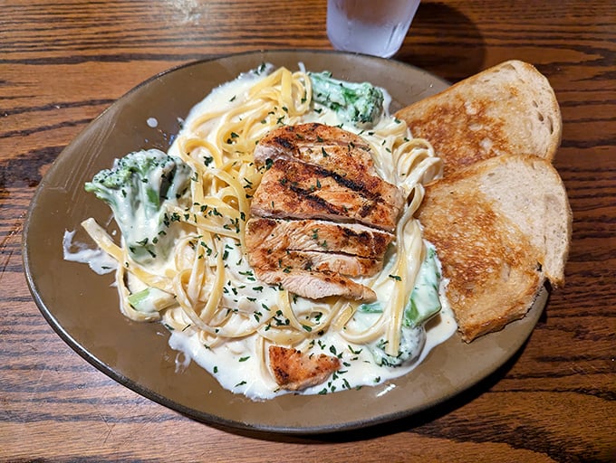 Pasta that doesn't play second fiddle to the steaks&mdash;creamy fettuccine, perfectly grilled chicken, and broccoli for those who need to pretend they're eating healthy.