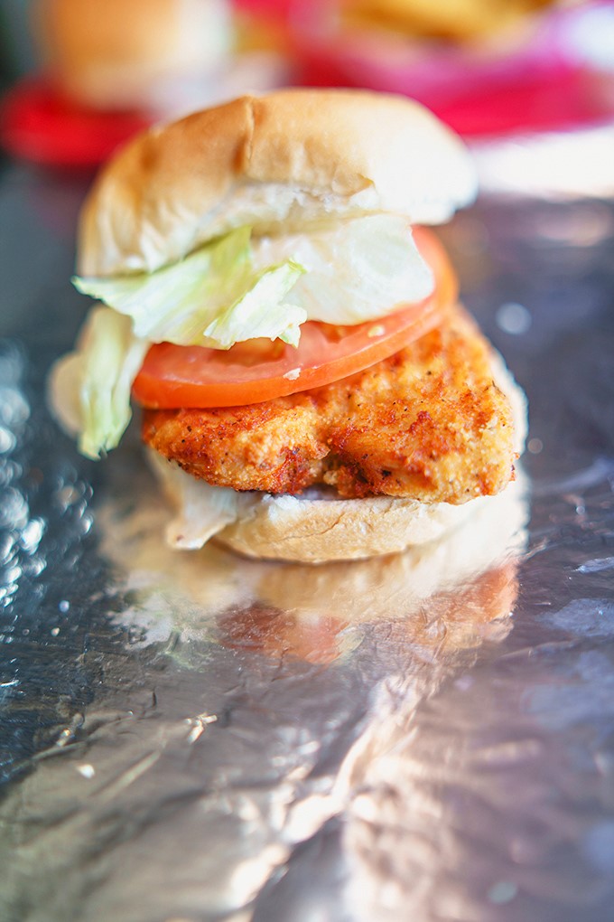 A chicken sandwich that doesn't need fancy frills to impress &ndash; just honest flavor, fresh toppings, and perfect seasoning.