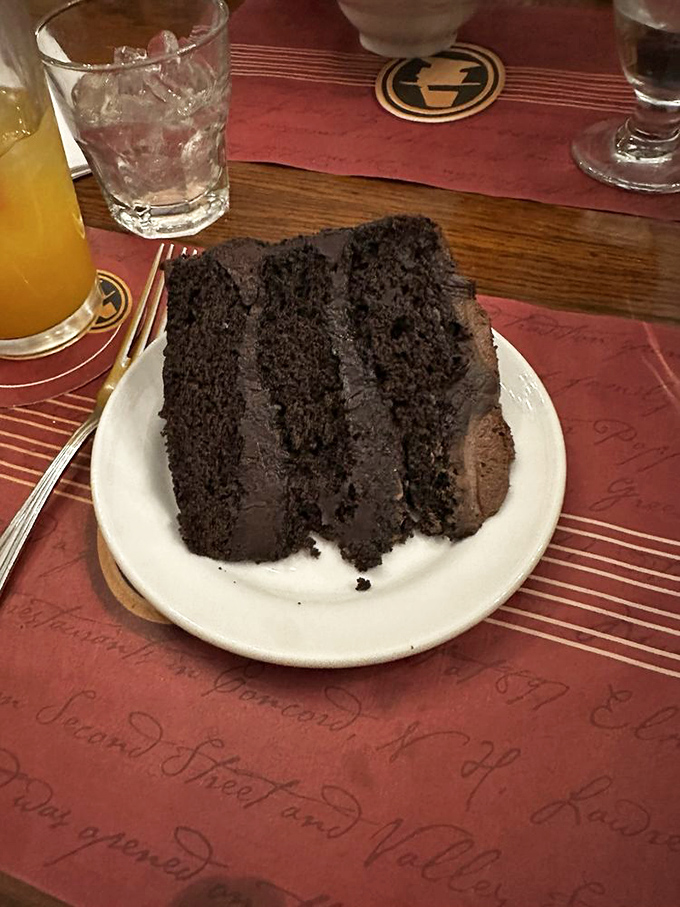 Chocolate cake so rich it should have its own tax bracket. The kind of dessert that makes you reconsider sharing.