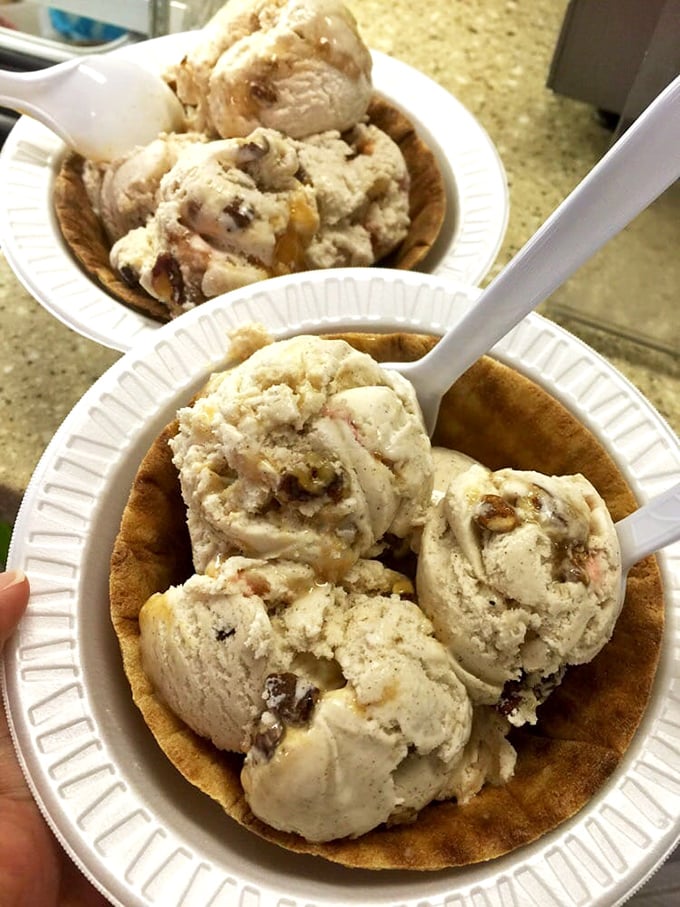 Cinnamon, caramel, and pecans dance together in this waffle bowl like they've been practicing the choreography for years&mdash;a perfect harmony of flavor and texture.