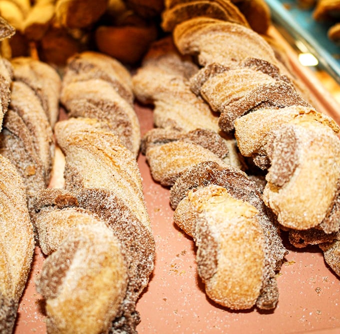 These sugar-dusted twists aren't just pastries&mdash;they're the reason buttons pop off shirts and belts need extra holes.