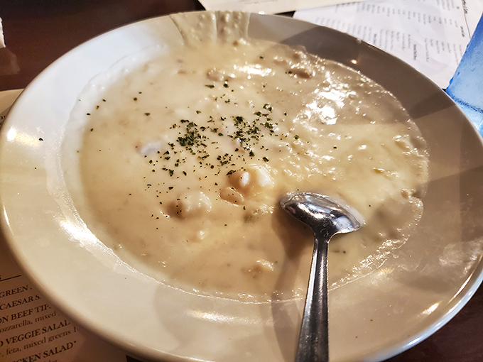This isn't just clam chowder – it's a creamy, soul-warming bowl of oceanic comfort that somehow tastes better 400 miles from the nearest coastline.