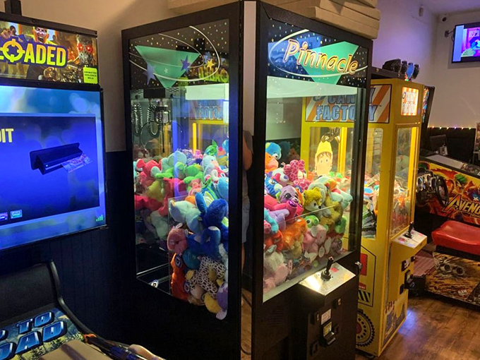The claw machine corner &ndash; where adults pretend they're playing for their kids while secretly hoping to win that blue stuffed elephant for themselves.