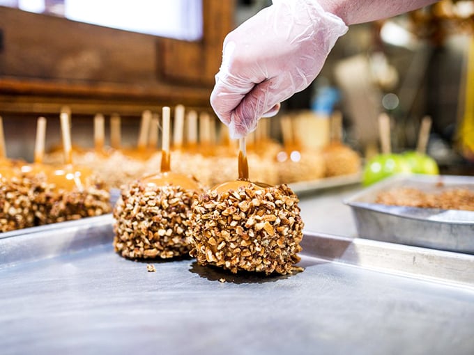 Witness the sacred ritual of caramel apple creation. Like watching Michelangelo paint, except you get to eat the masterpiece afterward.