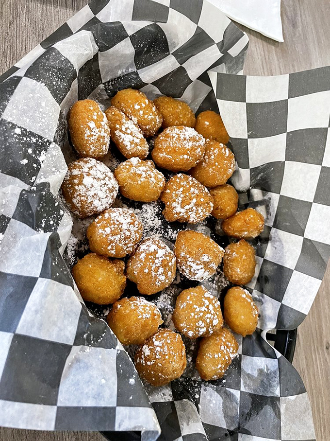 Hush puppies that don't know the meaning of "hush." These golden-fried cornmeal gems are so good they'll have you talking with your mouth full.