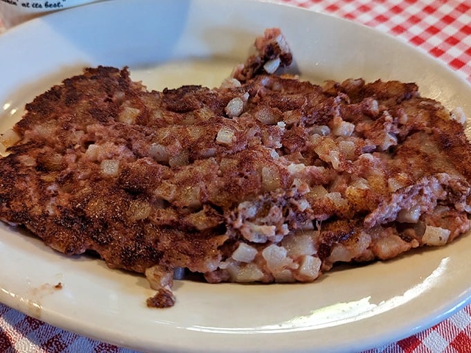 Corned beef hash with the perfect crispy-to-tender ratio that would make your cardiologist wince and your taste buds sing hallelujah.