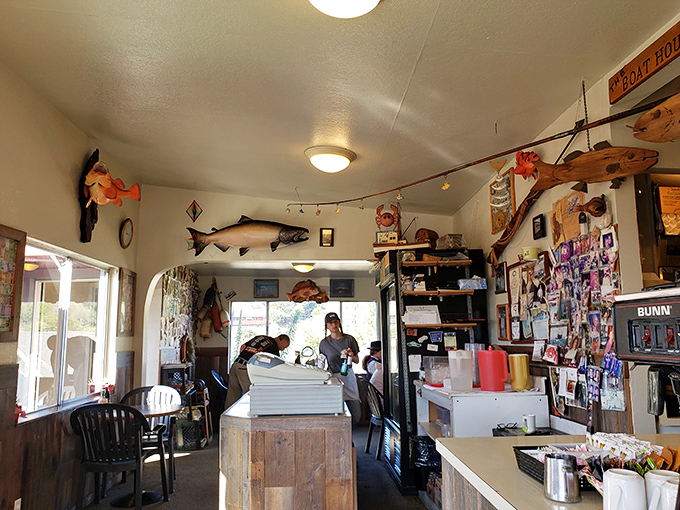 Wooden fish carvings watch over the dining room like guardians of seafood tradition, while decades of photographs tell stories of Bodega Bay's maritime history.