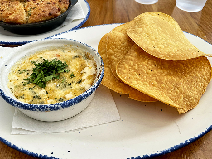 Creamy crab dip that demands to be scooped with those perfectly golden tortilla chips – a starter that frequently becomes the main event.