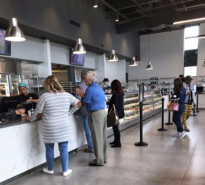 The universal language of waiting in line for something wonderful. These customers know that patience is rewarded with pastry at Oakmont Bakery.