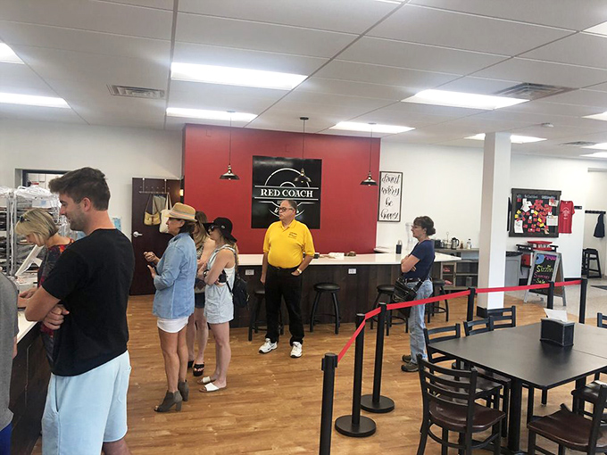 The universal language of waiting for donuts &ndash; patience rewarded with sweet treasures that justify every minute in line.