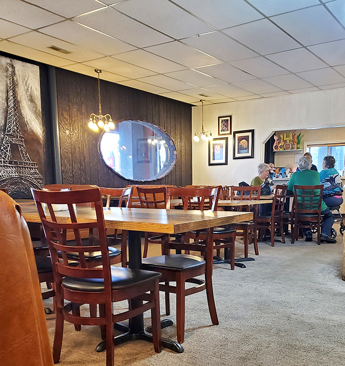 Wooden chairs, vintage light fixtures, and decades of conversations create the authentic ambiance no corporate restaurant chain could replicate.