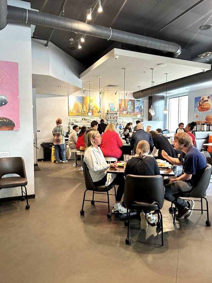The dining room hums with the universal language of good food, where strangers become united in the pursuit of breakfast bliss.