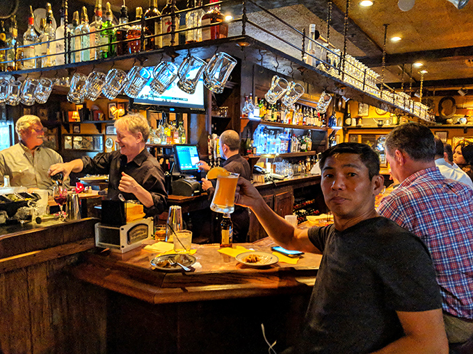 The bar isn't just where drinks are served&mdash;it's where strangers become friends and food becomes the universal language everyone suddenly speaks fluently.