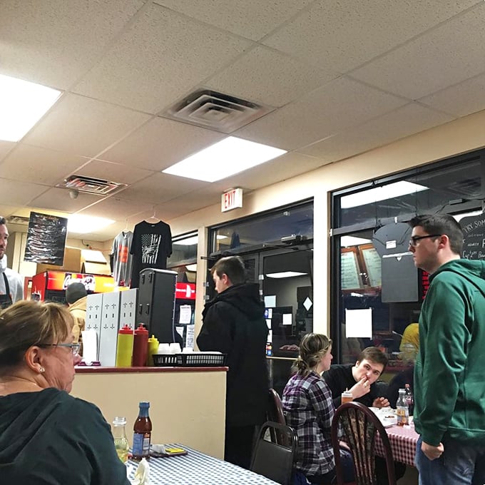 The universal language of good BBQ brings folks together. That focused expression says it all&mdash;conversation stops when the food arrives.