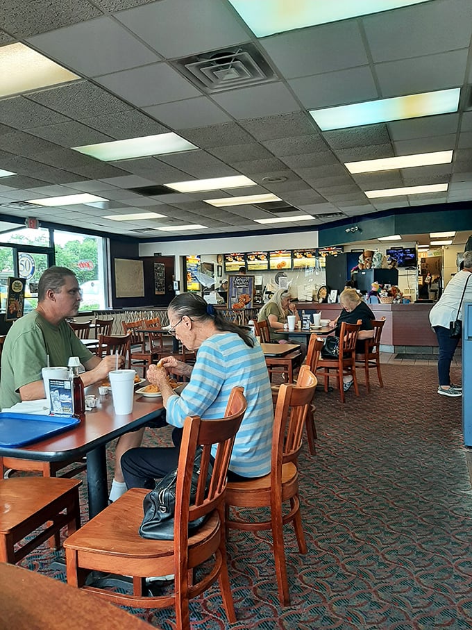Loyal patrons enjoying their meals in comfortable familiarity. For many, this isn't just lunch&mdash;it's a pilgrimage to taste memories that span generations.