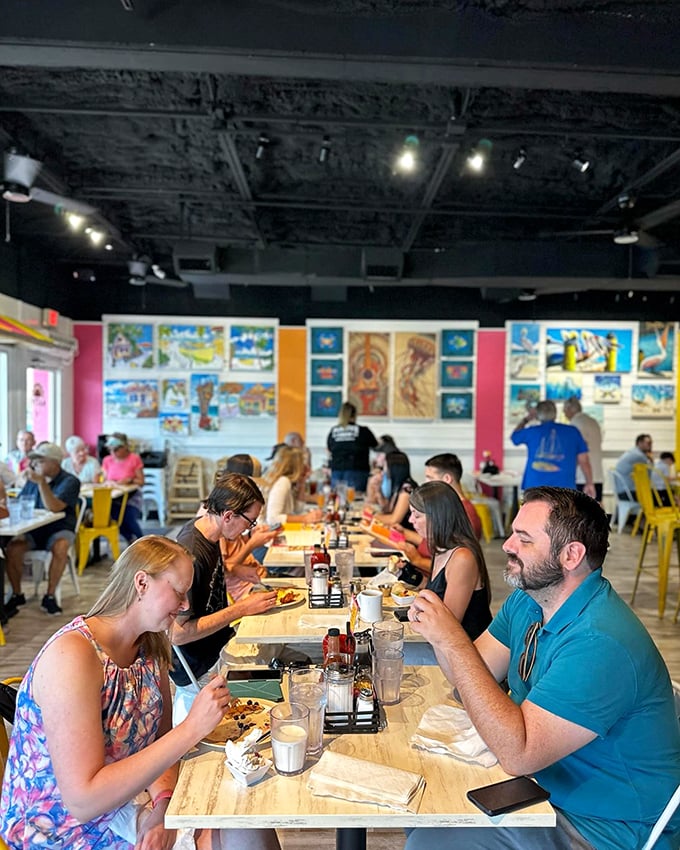 Real people enjoying real food without a phone in sight. It's like watching an endangered species in their natural habitat.
