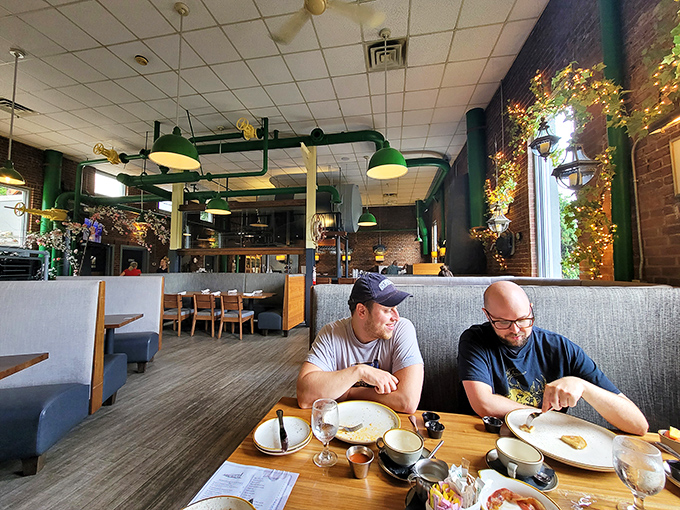 Fellow diners enjoying the fruits of the kitchen's labor&mdash;the universal language of good food bringing people together.