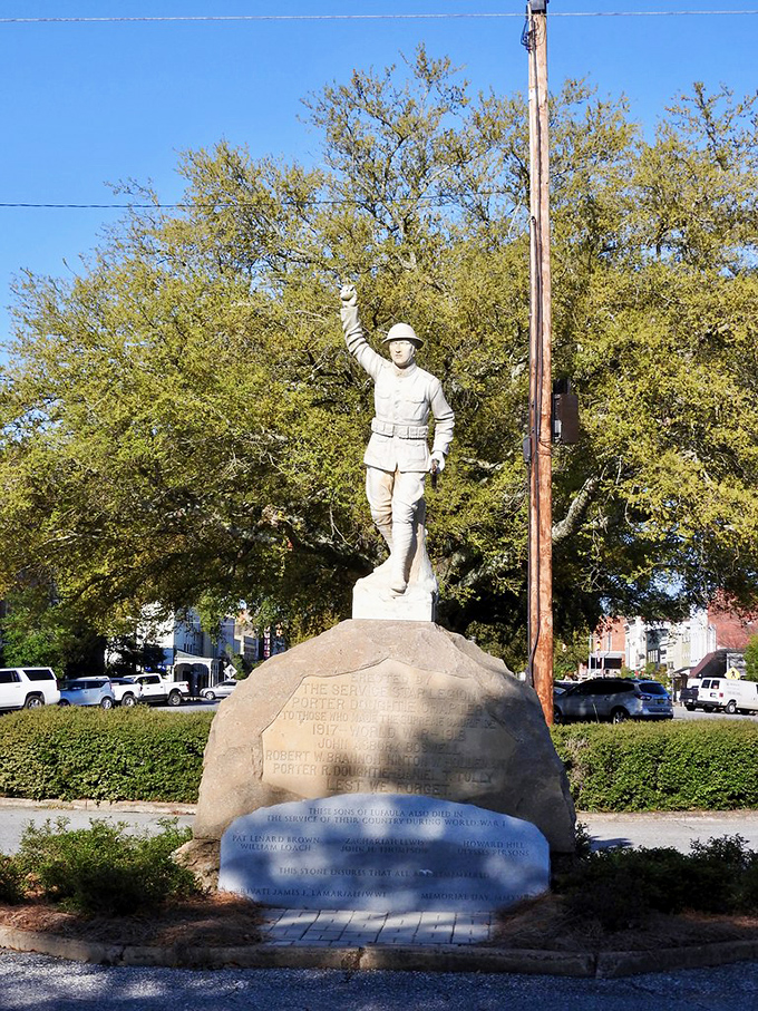 The Doughboy Monument stands at attention, a silent sentinel honoring those who served&mdash;some stories are etched in stone rather than told aloud.