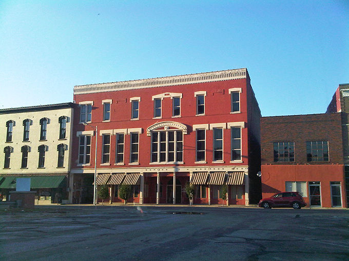 Historic downtown buildings stand shoulder to shoulder, their brick facades telling stories of boom times, hard times, and enduring community spirit.