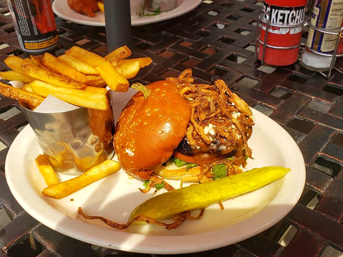 The Dublin Burger arrives like a delicious skyscraper of beef, cheese, and crispy onions &ndash; fork and knife recommended, napkins mandatory.