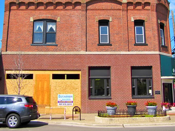 The historic Bank Block building stands as a testament to East Tawas' resilience. Even during renovation, its architectural details hint at stories from a bygone era.