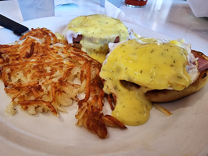 Eggs Benedict with hash browns crispy enough to make a potato proud. That hollandaise sauce is basically liquid sunshine.