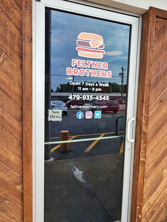 A door that might as well have "Portal to Satisfaction" etched above it. Note the hours&mdash;crucial intelligence for planning your next visit.