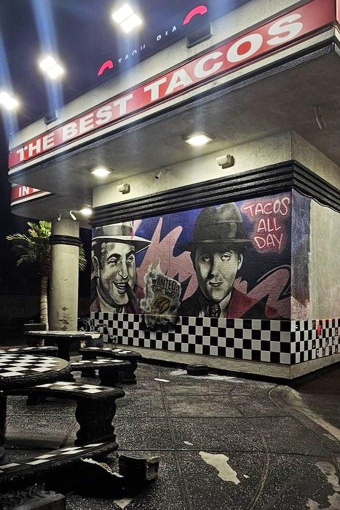 Night transforms Casa del Sabor into a neon-lit taco sanctuary. The mural says "TACOS ALL DAY," but we read it as "TACOS ALL LIFE."