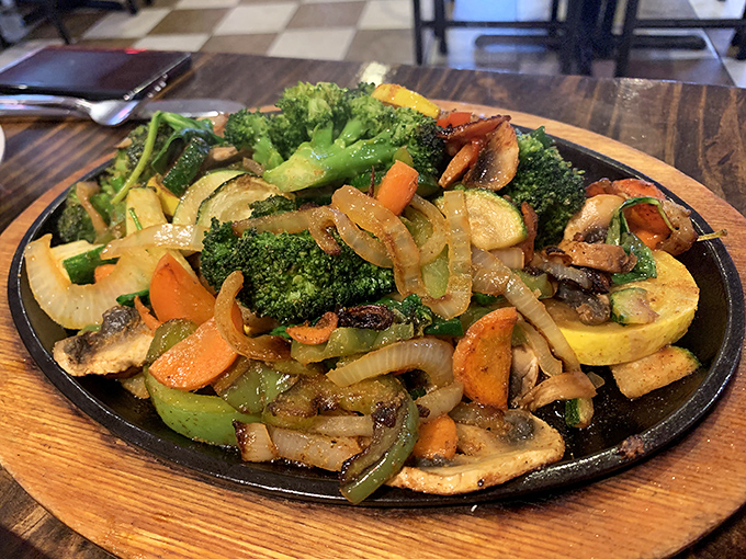 A sizzling skillet of vegetable fajitas that proves meat isn't always necessary for a fiesta of flavors that dance across your palate.