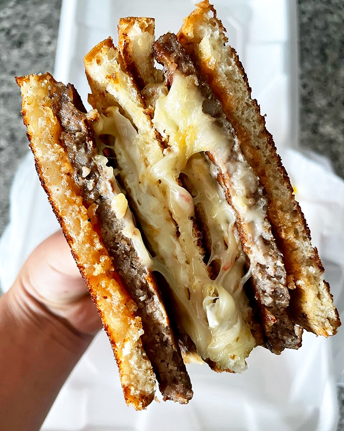 The maple bacon cinnamon roll&mdash;where breakfast meets dessert in a union so perfect it should have its own reality show.