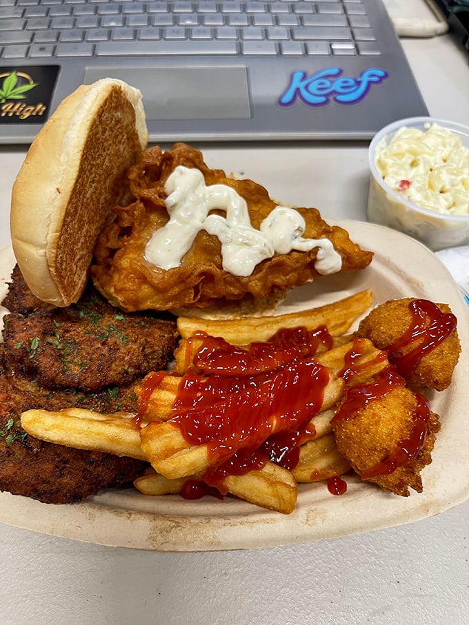The fish sandwich &ndash; where tartar sauce drips like a waterfall of flavor over perfectly fried fish. Ketchup-drizzled fries complete this masterpiece.