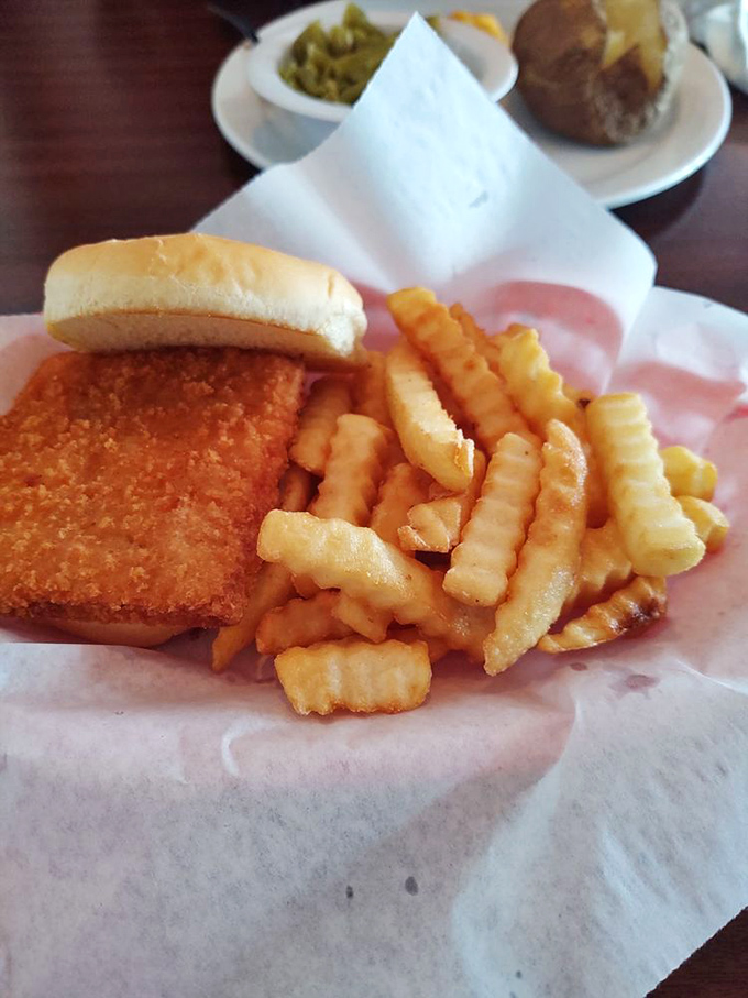 The breaded pork tenderloin sandwich &ndash; Indiana's unofficial state food &ndash; served with crinkle fries that crunch like autumn leaves.
