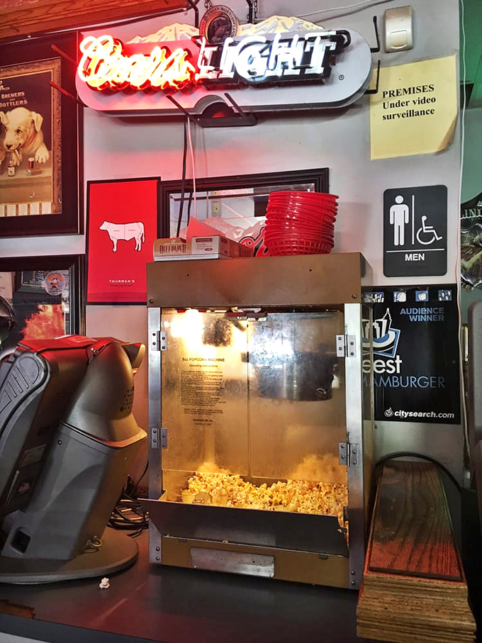 Free popcorn under the glow of neon &ndash; because sometimes you need an appetizer for your appetizer before tackling a Thurmanator.