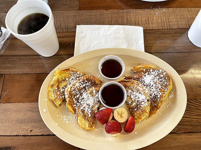 French toast that's been kissed by the griddle and dusted with powdered sugar proves that breakfast can be both a meal and a love letter.