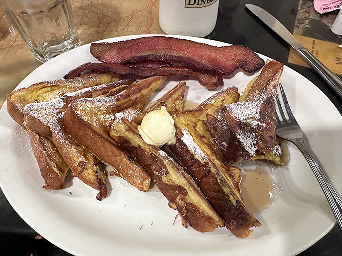 French toast that's achieved breakfast nirvana&mdash;crispy edges, custardy centers, and a dusting of powdered sugar that melts into the maple syrup.