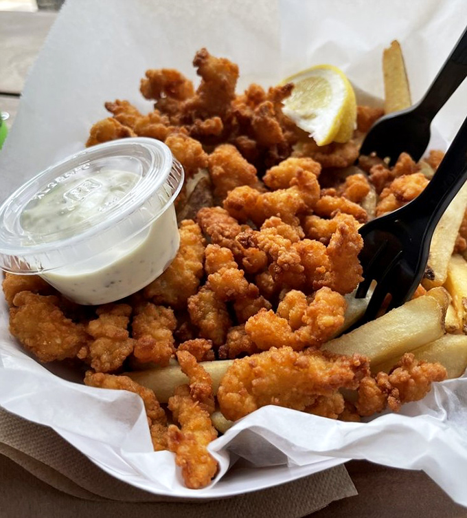 Fried clams so good they'd make a New Englander weep with joy. The tartar sauce is just showing off at this point.