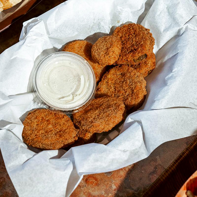 Fried green tomatoes &ndash; proof that anything becomes magical when breaded, fried, and served with a side of creamy dipping salvation.