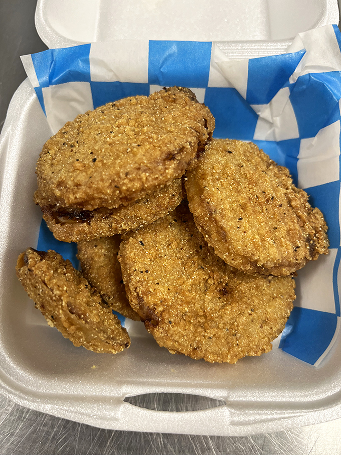 Fried green tomatoes with a cornmeal crust so perfect, you'll wonder why more vegetables don't disguise themselves this way.