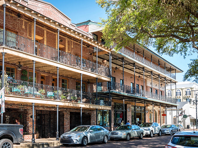 These multi-story balconies aren't just architectural features&mdash;they're front-row seats to the daily theater of Natchitoches street life.