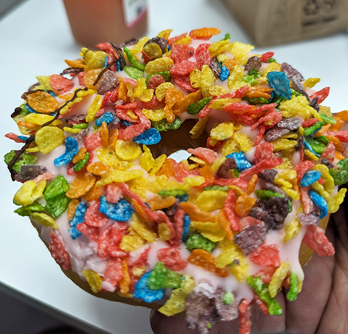 The Fruity Pebble donut &ndash; childhood breakfast cereal meets grown-up indulgence in a riot of color that makes your inner eight-year-old high-five your adult self.