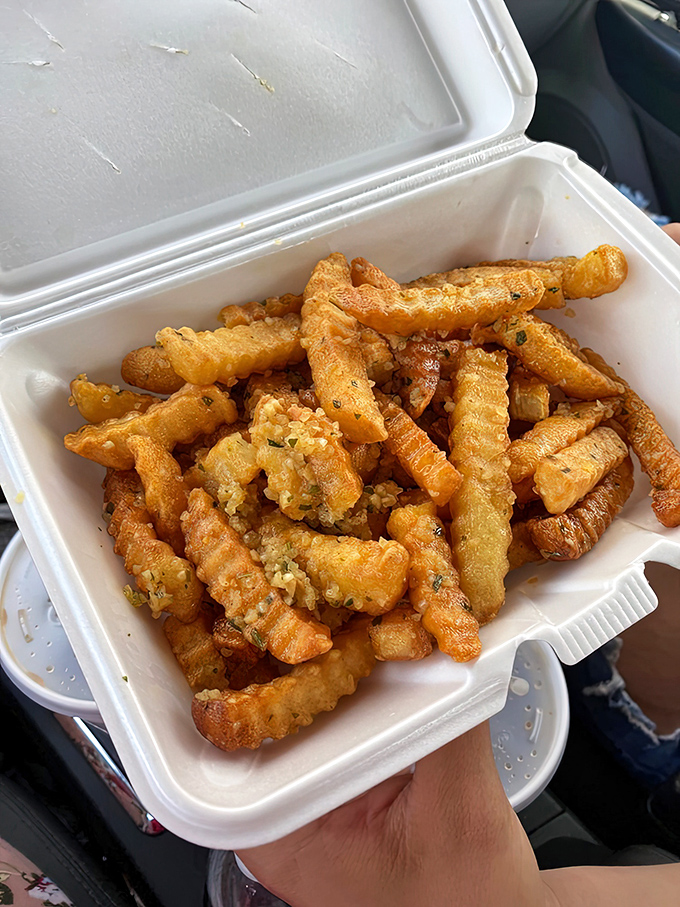 Garlic fries that don't whisper their presence&mdash;they announce it with golden, crispy authority and unapologetic flavor.