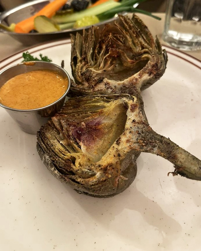 The humble artichoke, transformed by fire and seasoning into something extraordinary. That dipping sauce is liquid gold waiting to be discovered.