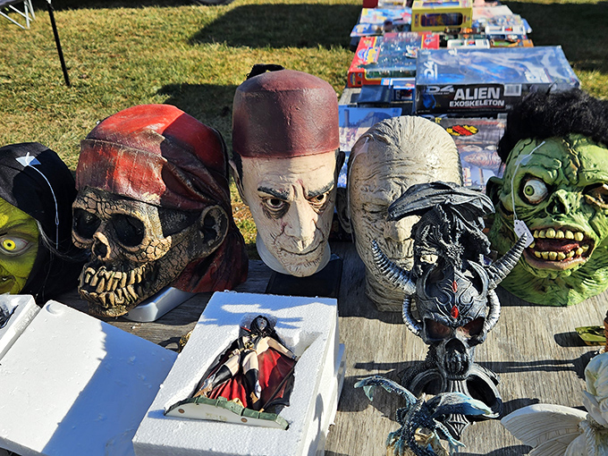 Halloween masks grin menacingly from their table display. From pirates to aliens, your next costume party identity crisis solved!