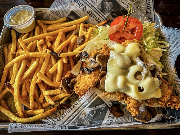 The famous Hogfish Sandwich&mdash;a masterpiece of sweet fish, melted Swiss, and saut&eacute;ed mushrooms that people drive hours to experience.